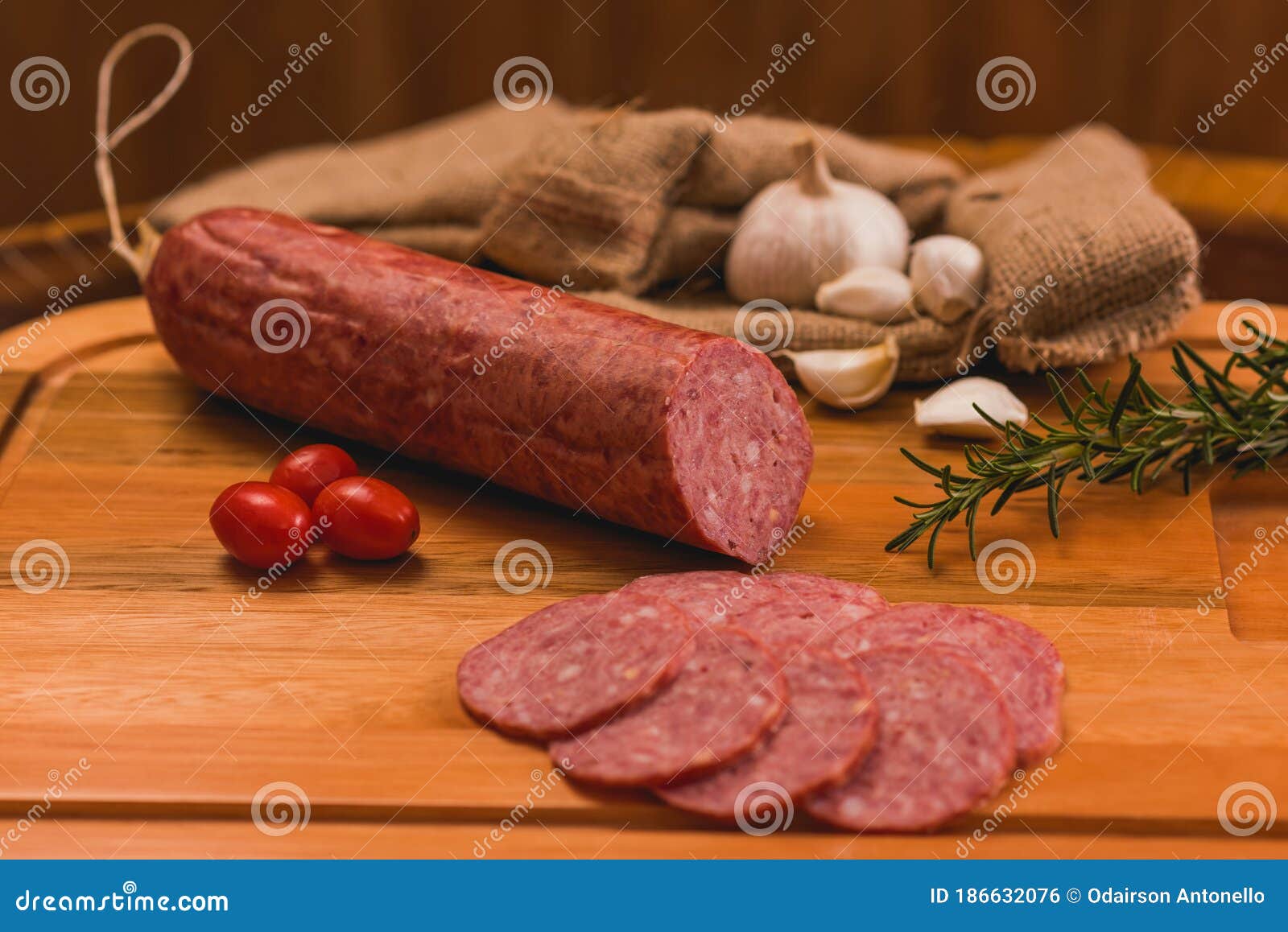 Italian Salami on Rustic Table. Stock Photo - Image of parsley, italian ...