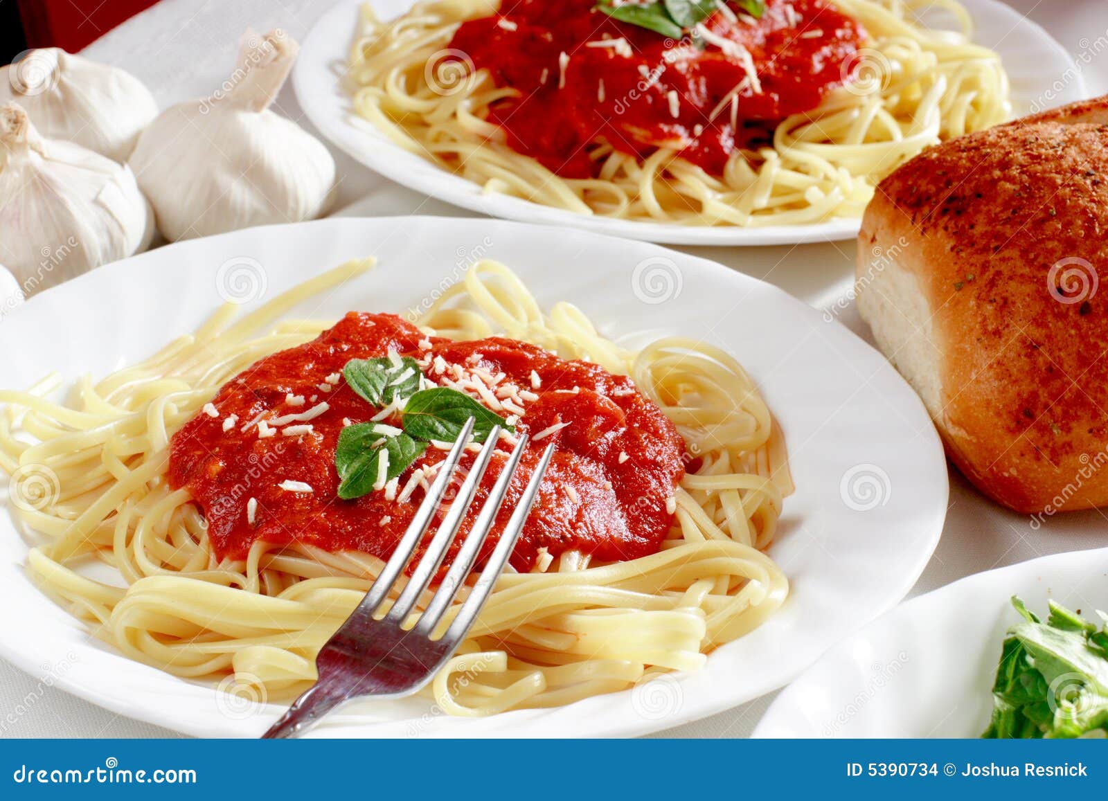 Italian spaghetti dinner stock photo. Image of loaves - 5390734