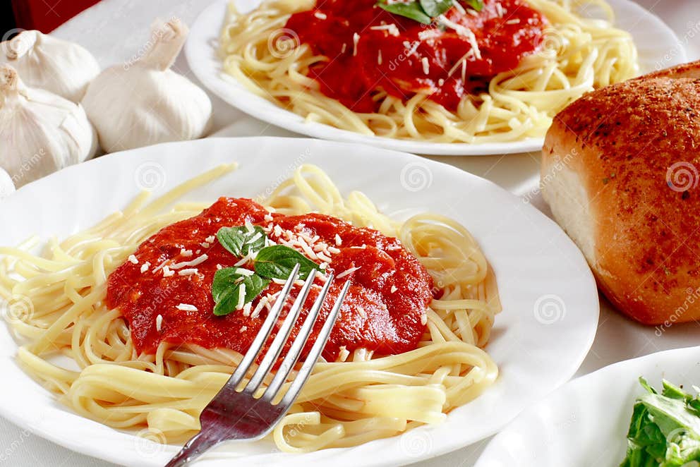 Italian spaghetti dinner stock photo. Image of loaves - 5390734