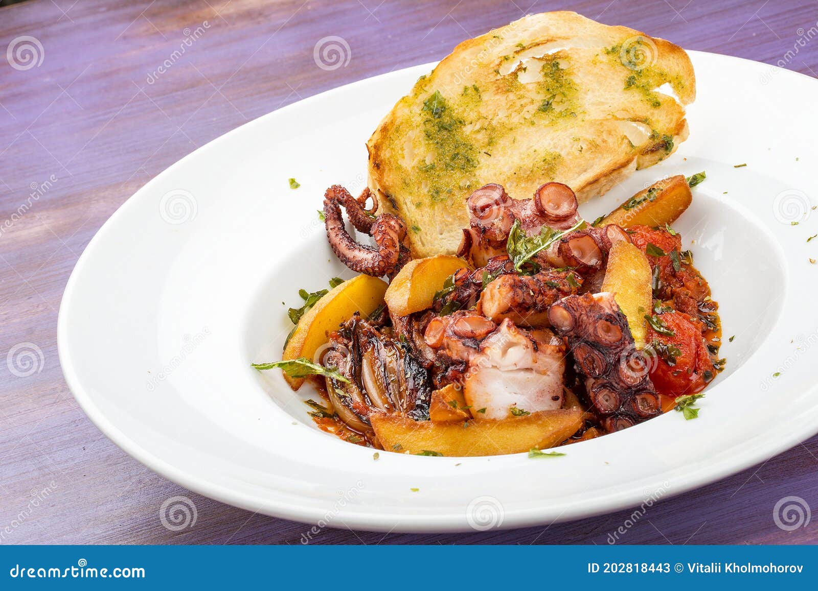 Italian-style Fried Octopus with Tomatoes and Potatoes Stock Image ...