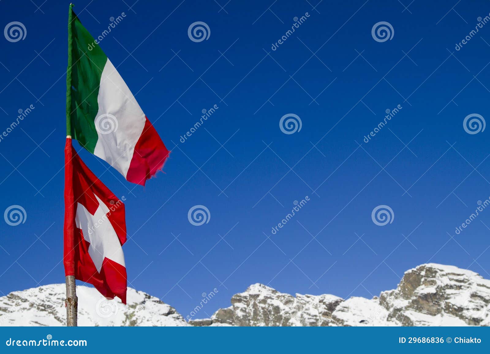 Italian and Switzerland Flags Stock Photo - Image of snow, blue: 29686836
