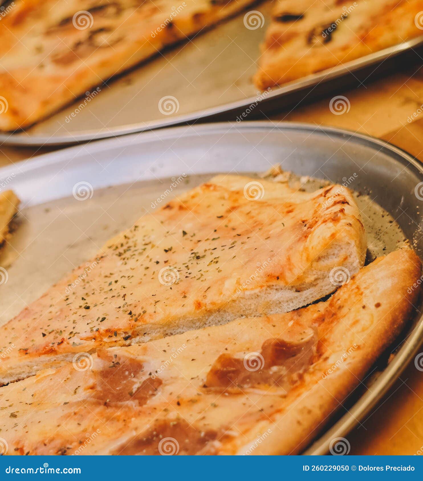 Italian Thin Crust Pizza Slices Stock Photo - Image of board, dish ...