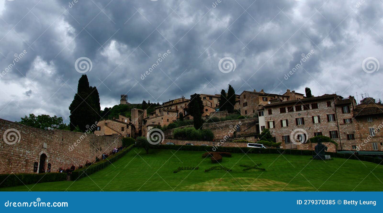 Medieval Buildings with Trees and Lawn in Assisi, Italy Stock Image ...