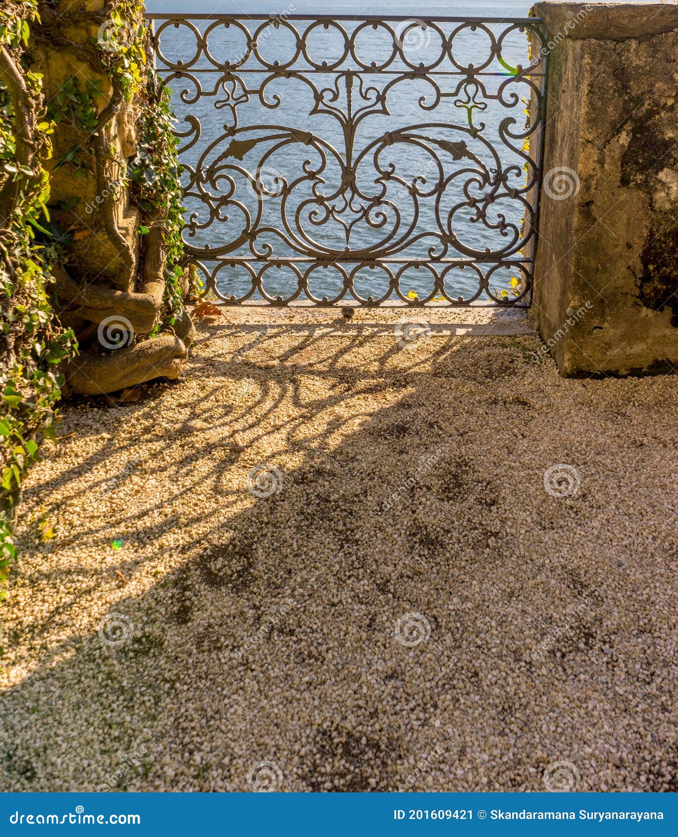 Italy, Lecco, Lake Como, Gate Leading To Lake Stock Image - Image of ...
