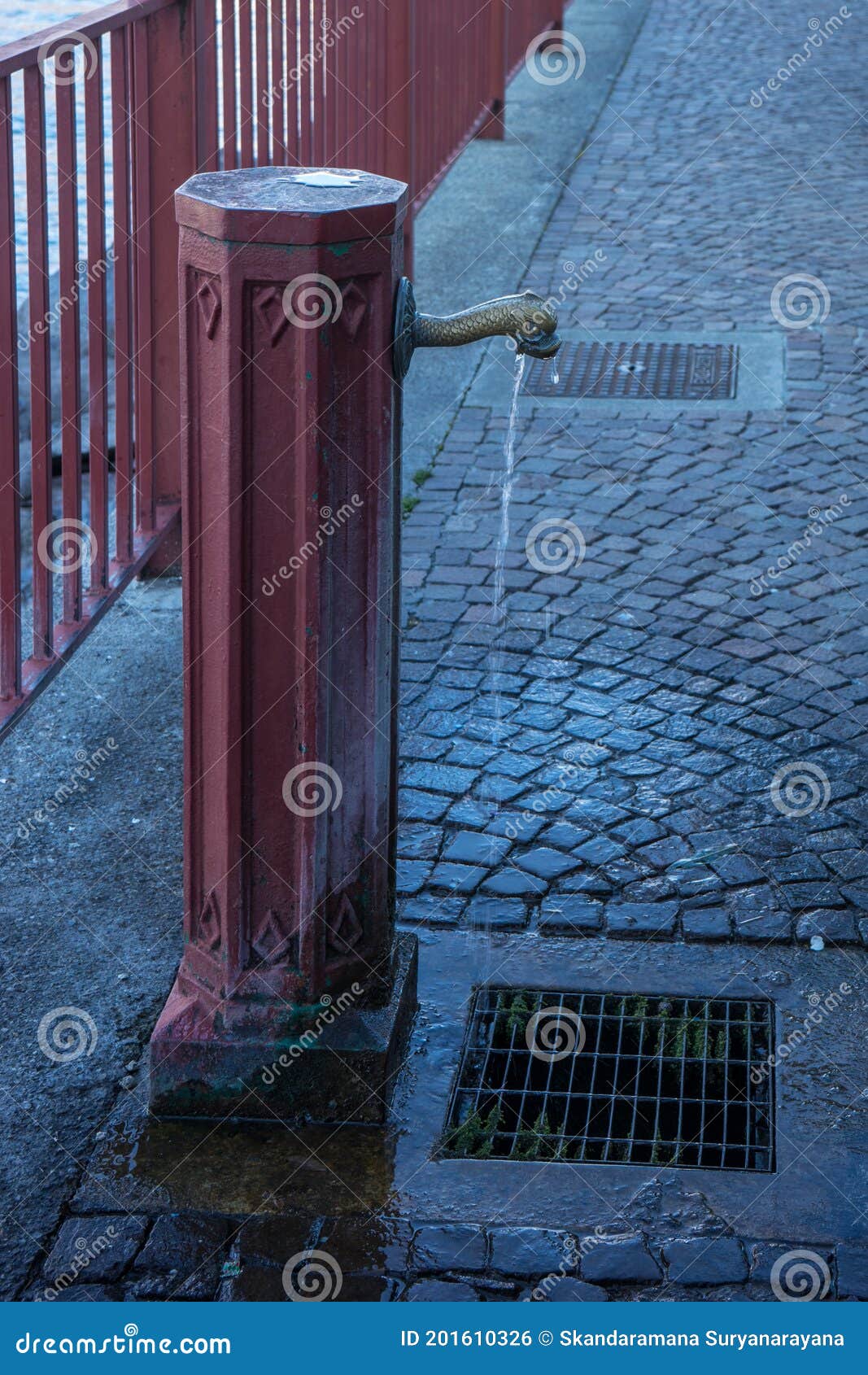 Italy, Menaggio, Lake Como, a Red Fire Hydrant Sitting on the Side of a ...