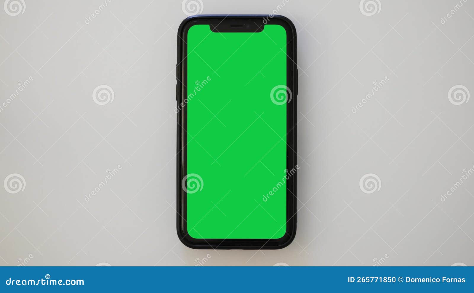 Italy - 2023: Single Tapping on a Green Screen IPhone on the Couch ...