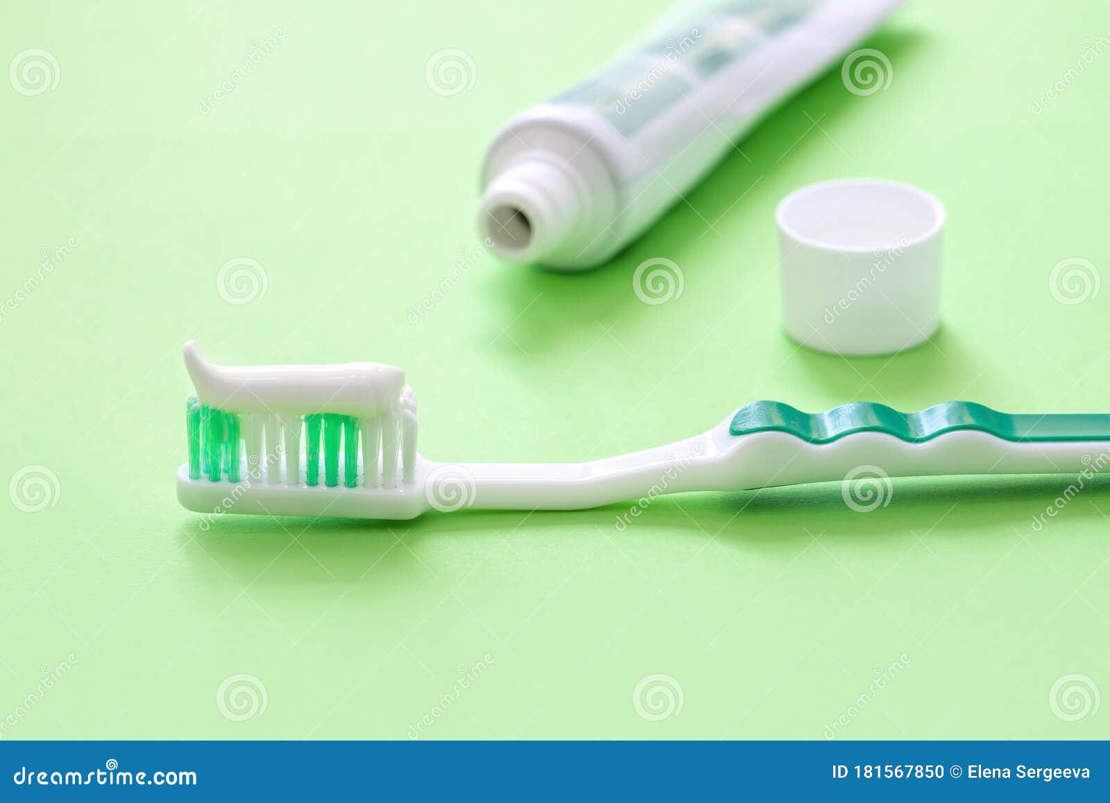 Items for Brushing Teeth on a Green Background Stock Photo - Image of ...