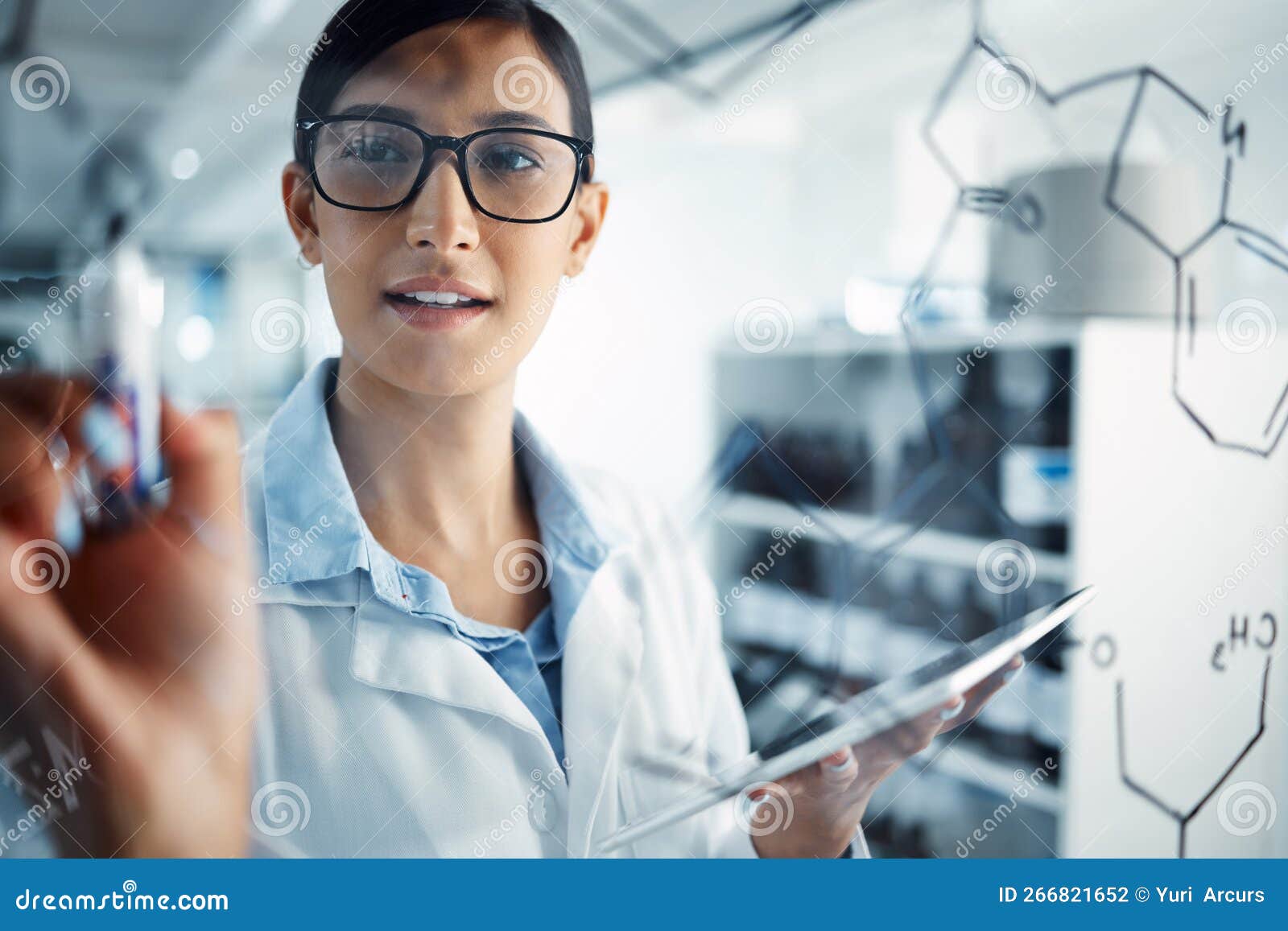 Itll All Make Sense Soon. a Young Scientist Solving Equations on a ...