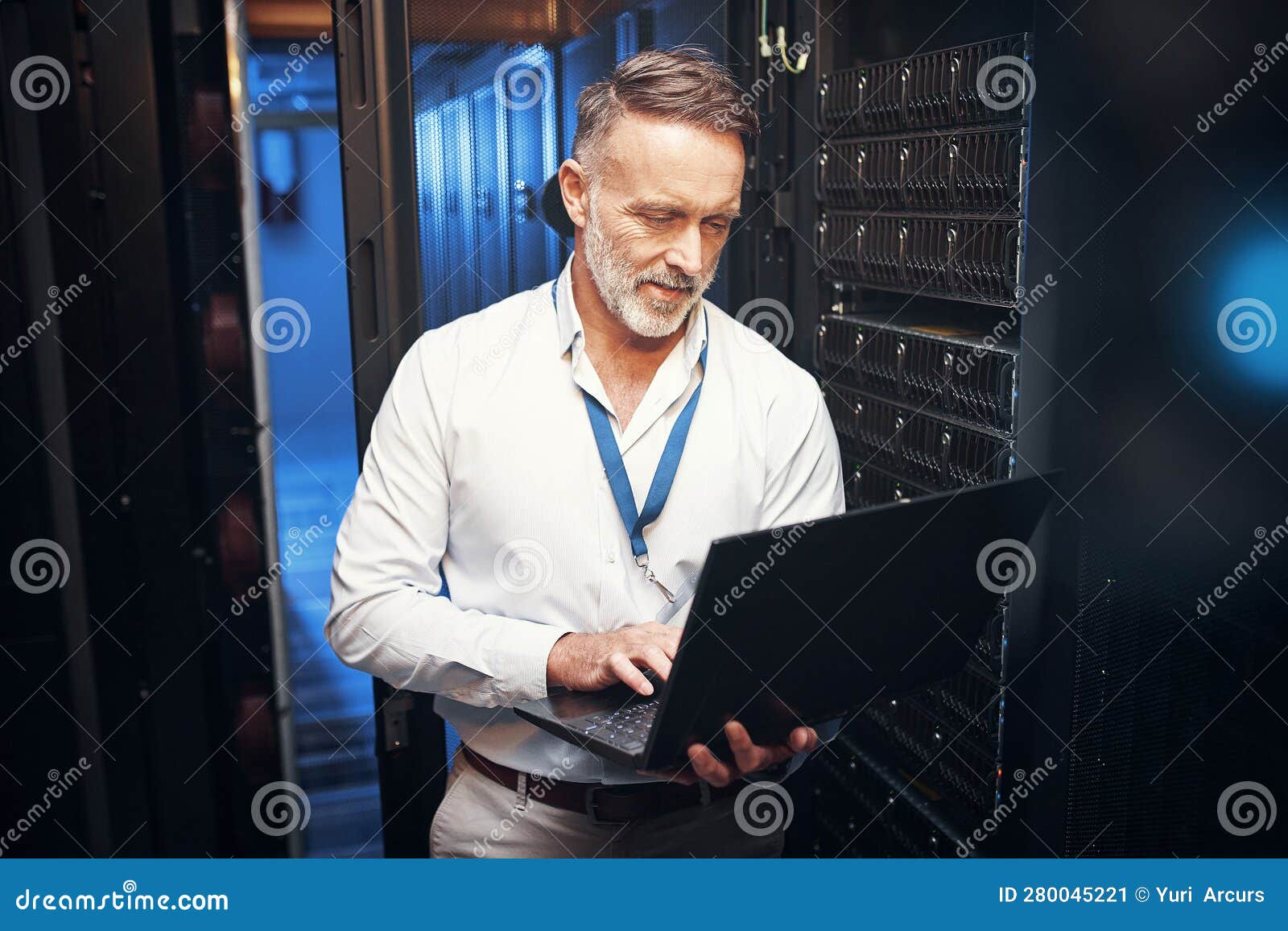 Itll Be Fixed in a Few Seconds. a Mature Man Using a Laptop while ...