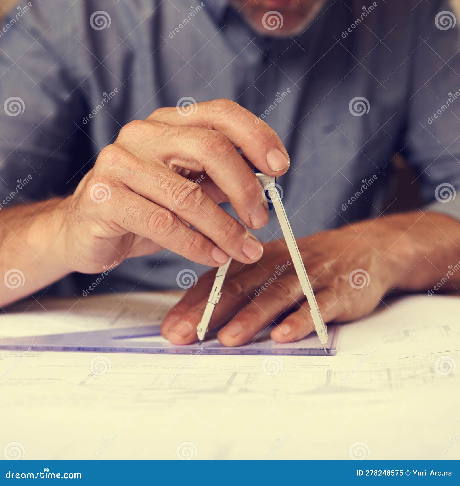 Its All about Accuracy. a Draftsman Using a Triangle and Compass To ...