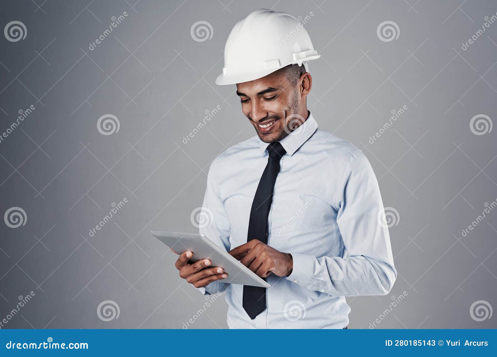 Its All Coming Together Now. a Well-dressed Civil Engineer Using His ...