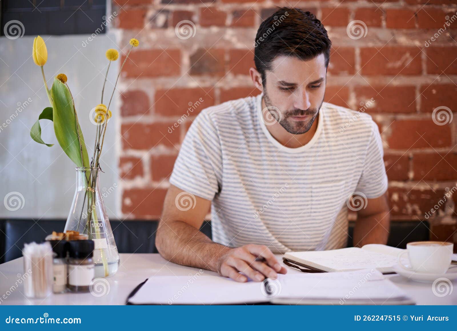 Its All about Planning Properly. a Handsome Young Man Writing in a ...