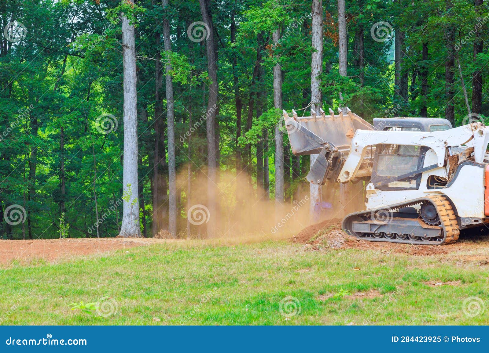 Bulldozer Carries Out Excavation Work During The Construction And ...