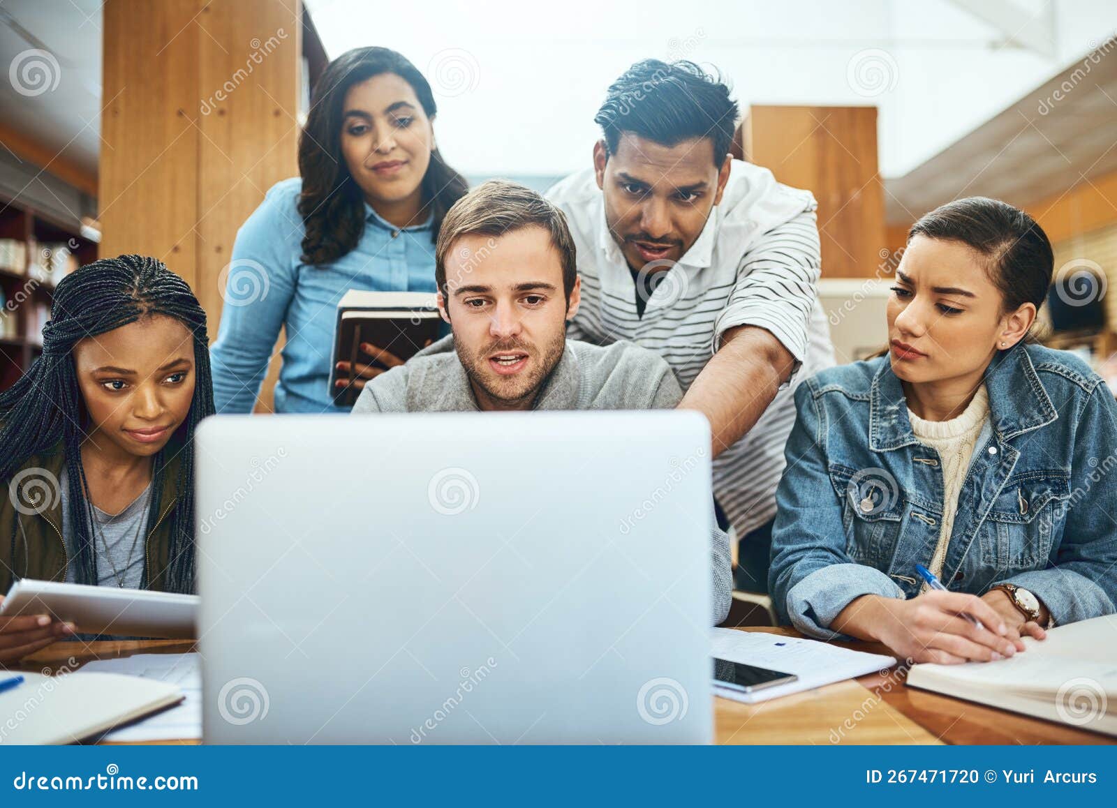 Its Easier in a Study Group. a Group of University Students Studying in ...