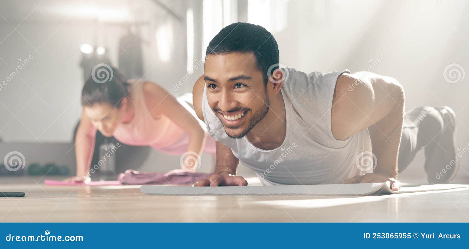 Its Hard Work but Its Also Fun. Two Young Athletes Working Out Together ...