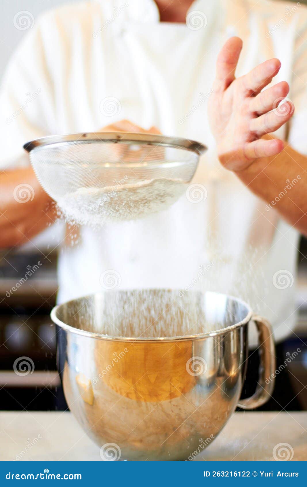 Its an Important Step. a Baker Sifting Flour into a Metal Bowl. Stock ...