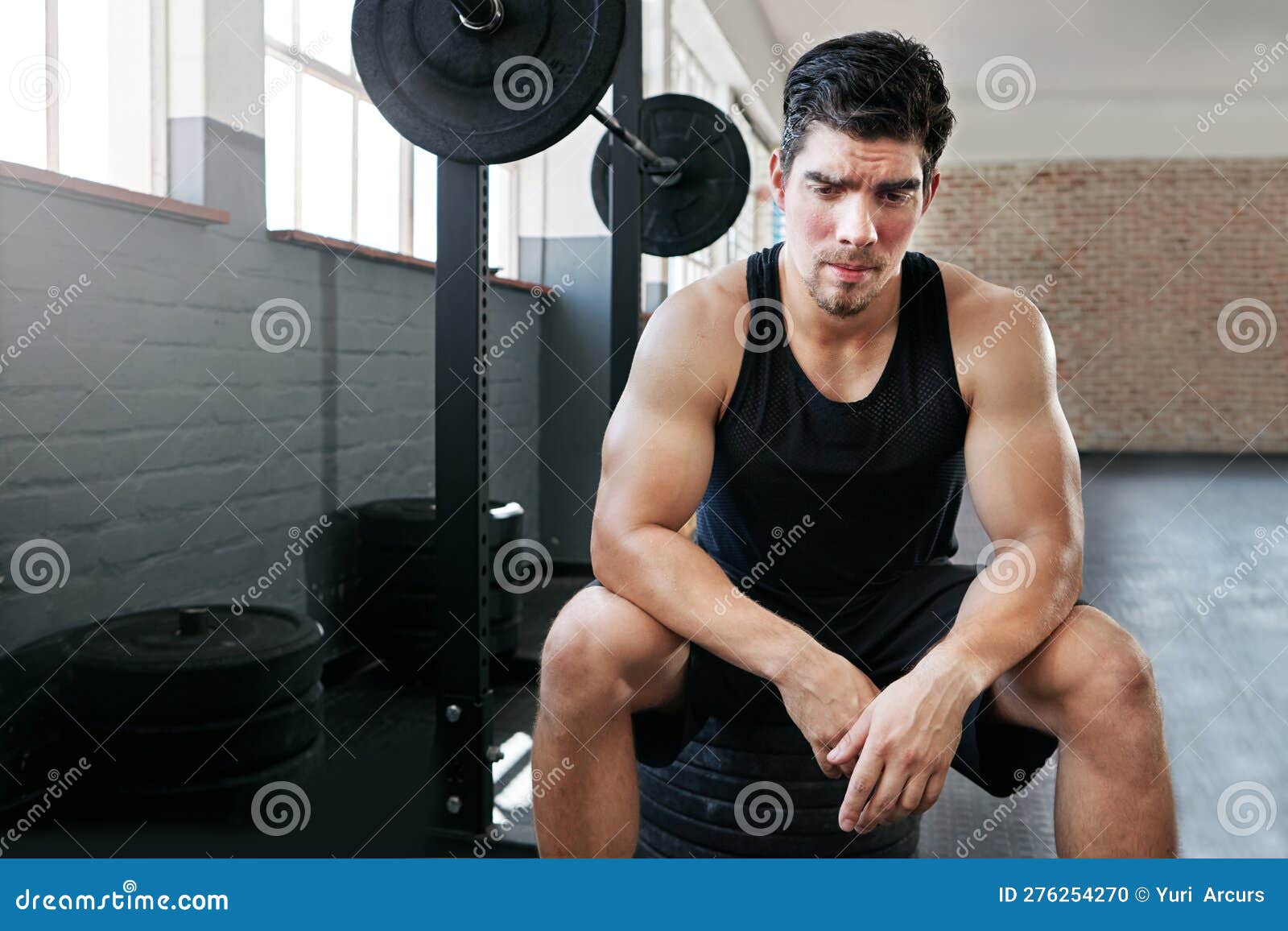 Its Not Called Working Out for Nothing. a Young Man Taking a Break from ...