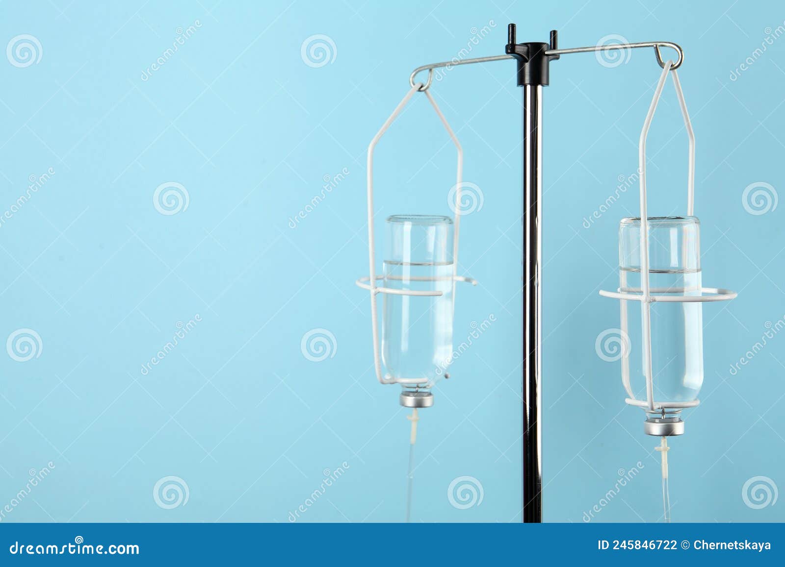 IV Infusion Set on Light Blue Background. Space for Text Stock Photo ...