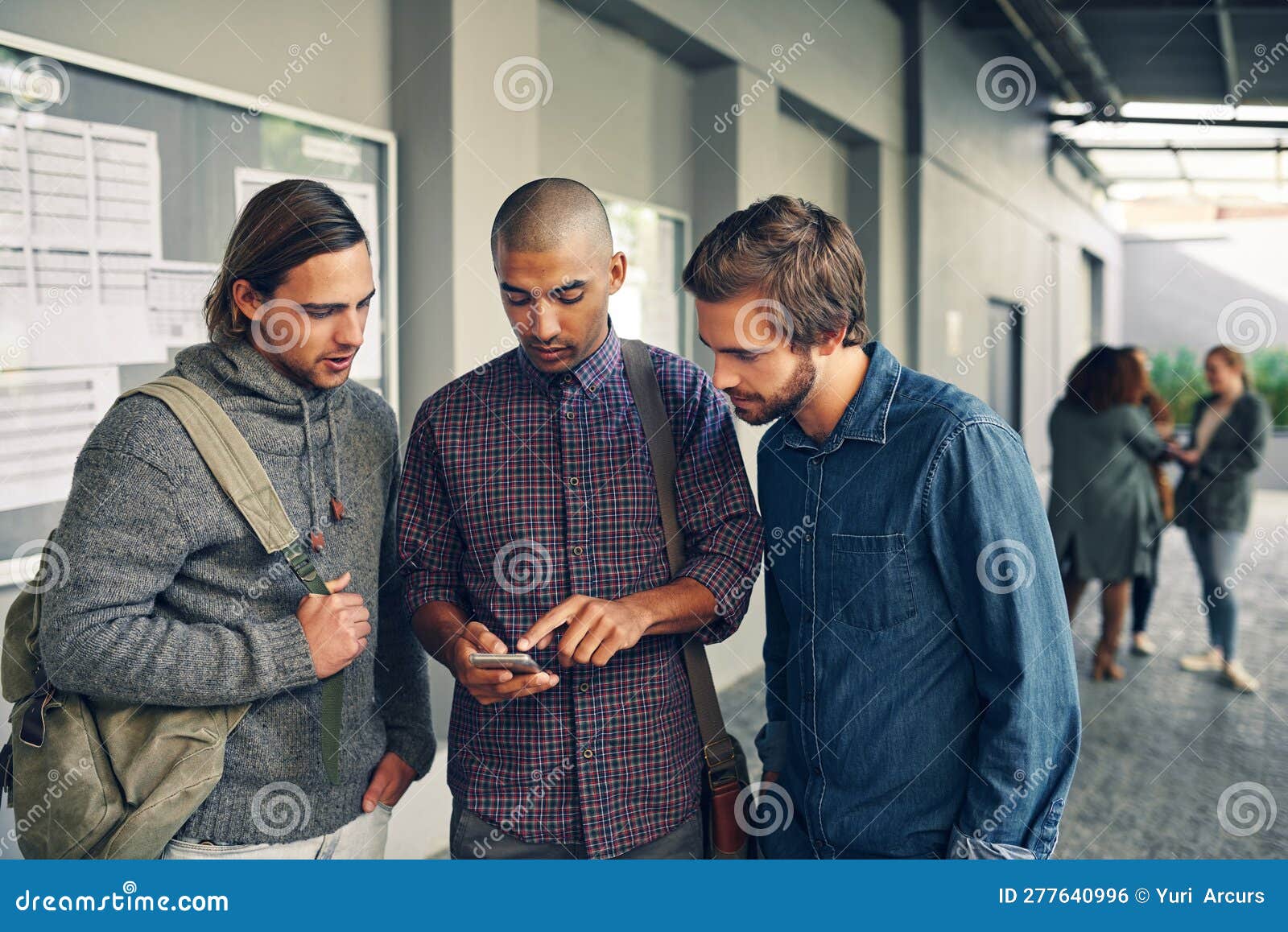 Ive Got the Class Schedule in My Phone. a Group of Young Students Using ...