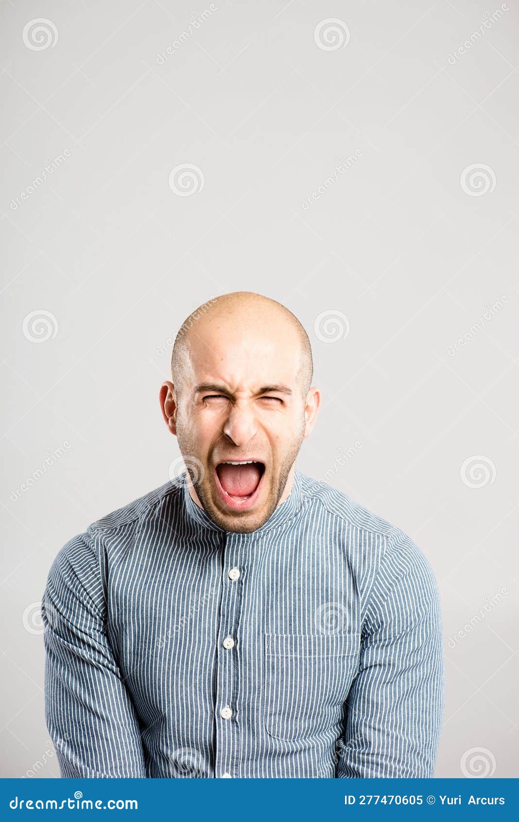 Ive Had Enough. a Handsome Young Man Standing Alone in the Studio and ...