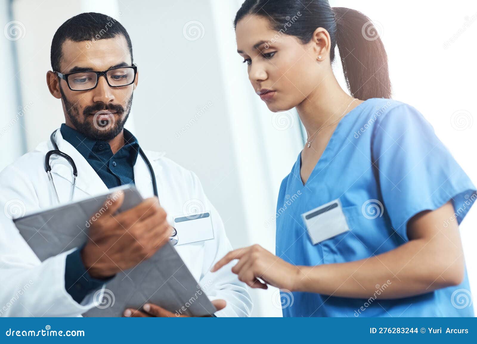 Ive Noticed an Irregularity Here. Two Young Doctors Using a Digital ...