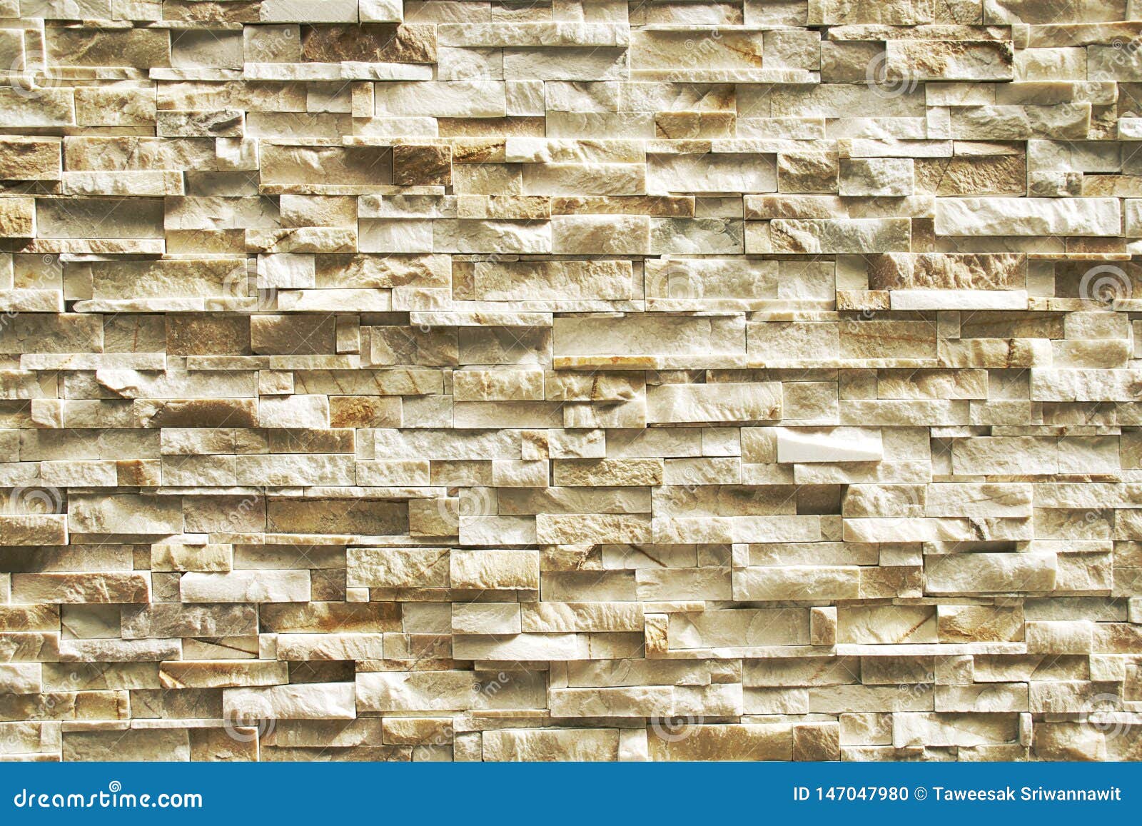 Ivory Split Face Stone in Random Pattern Wall As Background Stock Photo ...