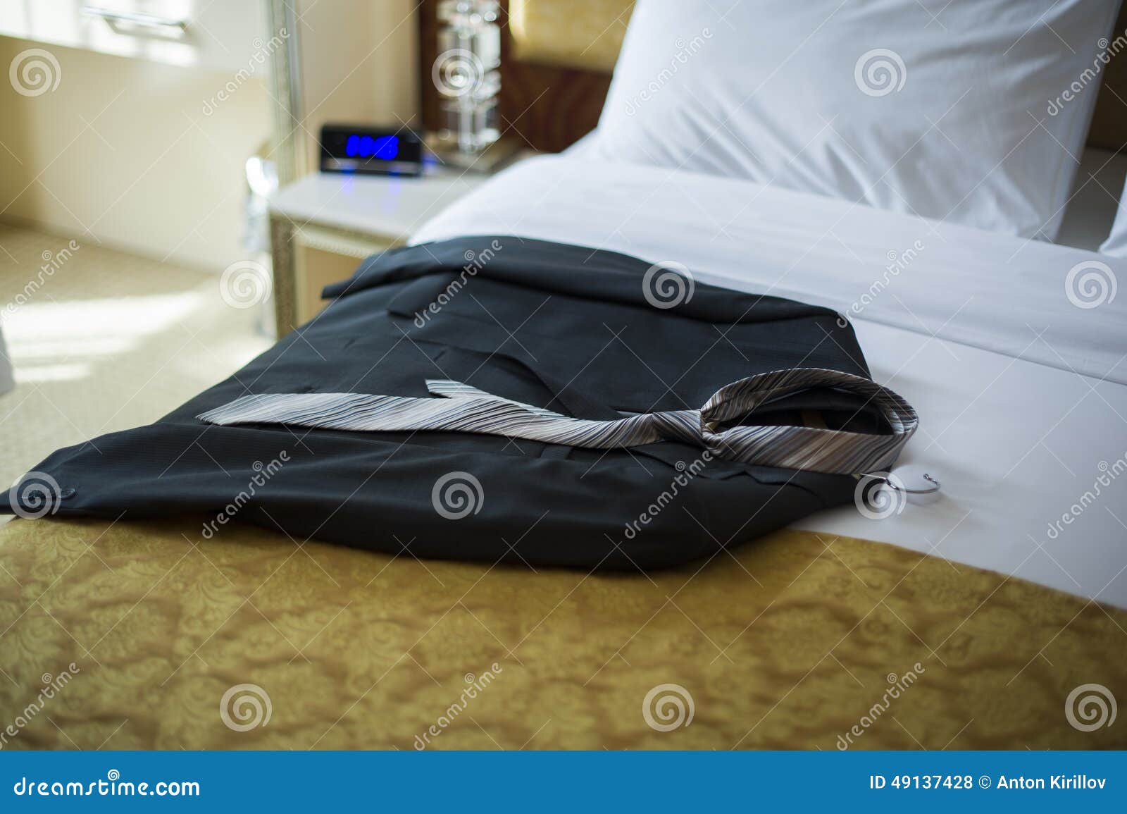 Jacket Lying on a Bed in a Hotel Room Stock Photo - Image of party ...