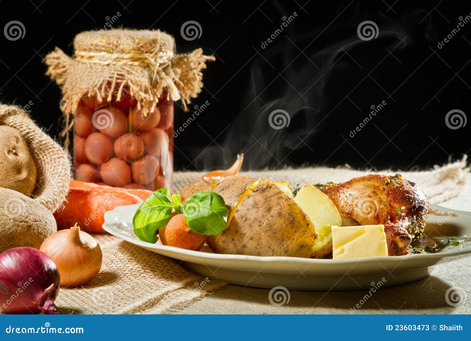 Jacket Potatoes and Roast Chicken Stock Image - Image of butter ...