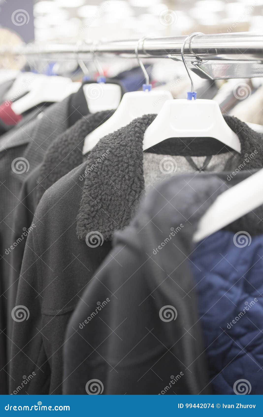Men`s Jackets on the Counter in the Store Stock Photo - Image of ...