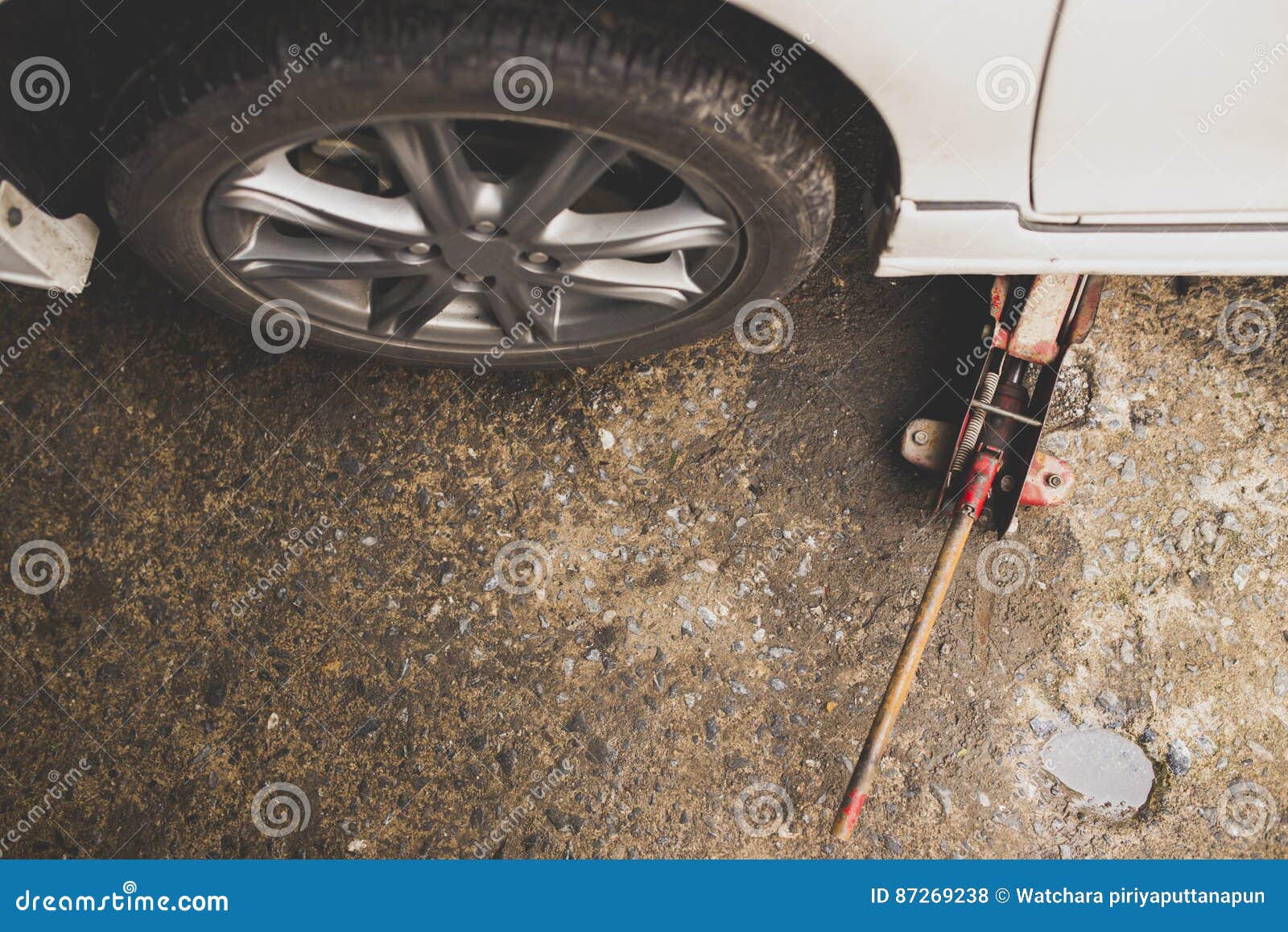 Jacking up a car. stock photo. Image of stransport, stand - 87269238