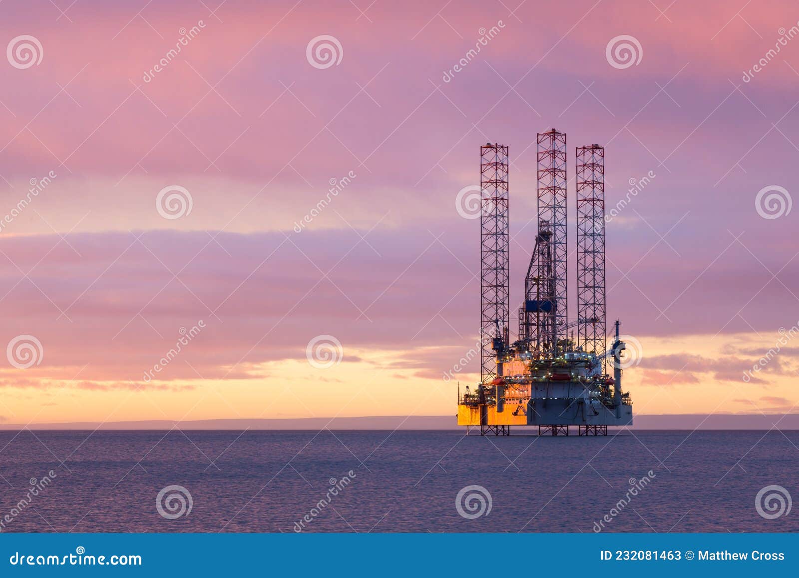 Jackup Moveable Oil Platform at Sunset in Gulf of Mexico Stock Image ...