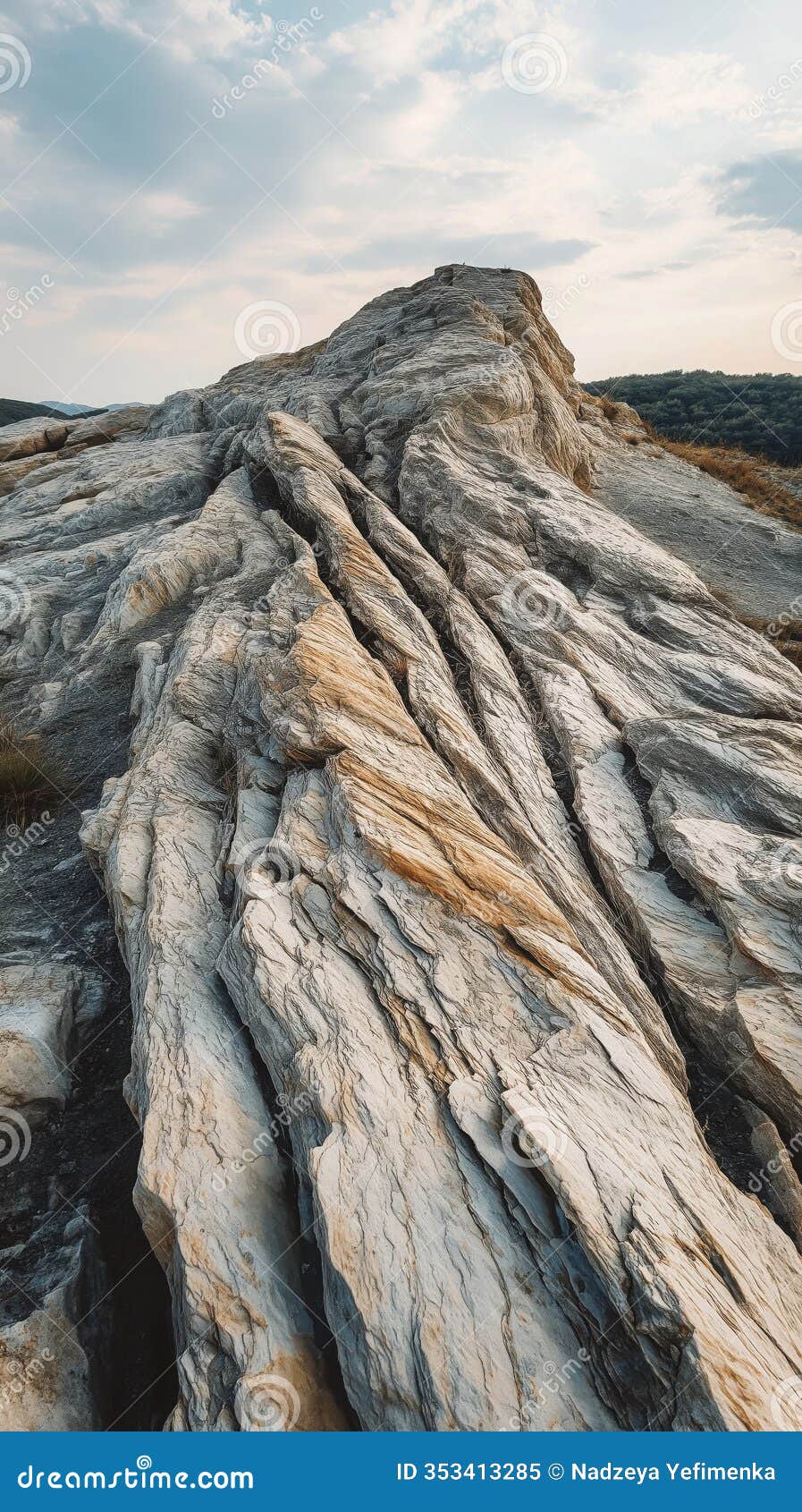 Jagged Limestone Ridge Under Softly Lit Sky Featuring Layered Textures ...