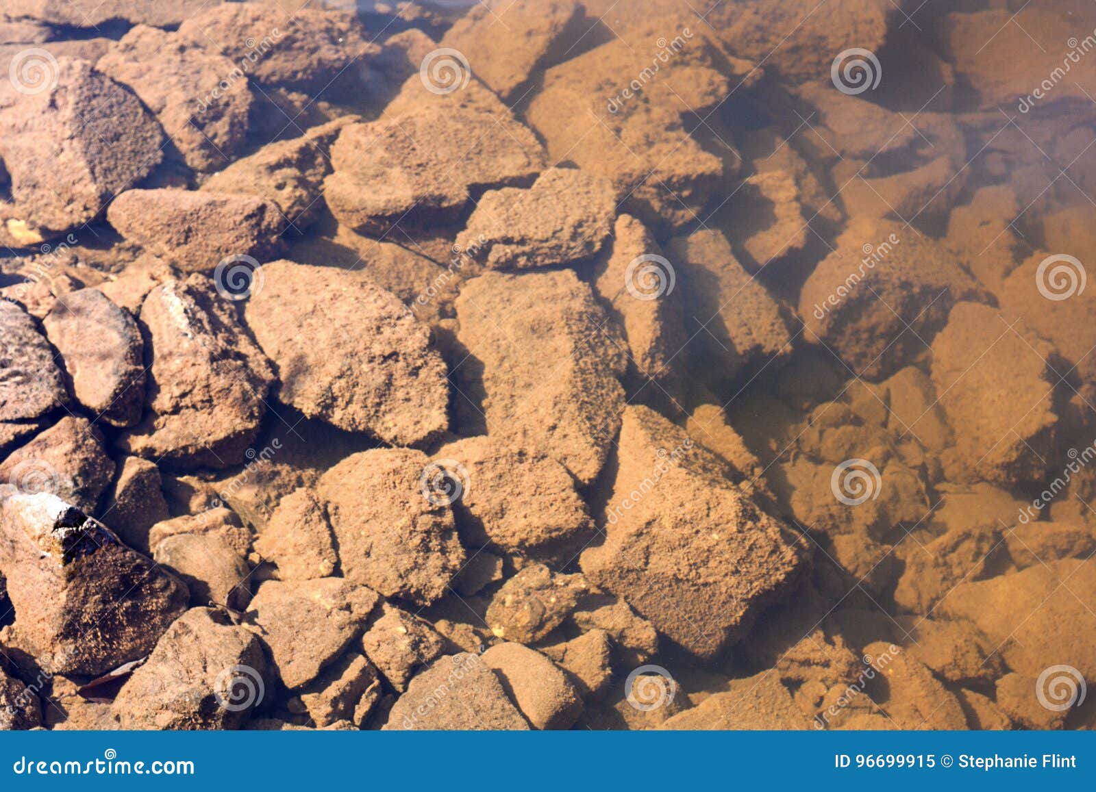 Jagged Red Rocks Underwater Stock Image - Image of shore, geology: 96699915