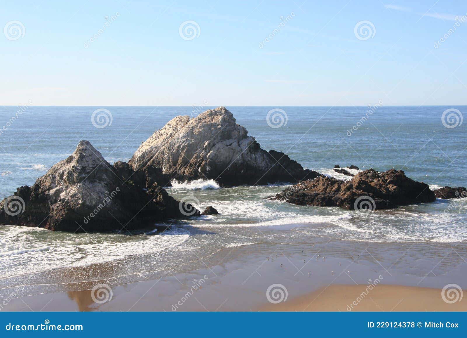 Jagged Rock and Ocean stock photo. Image of formations - 229124378
