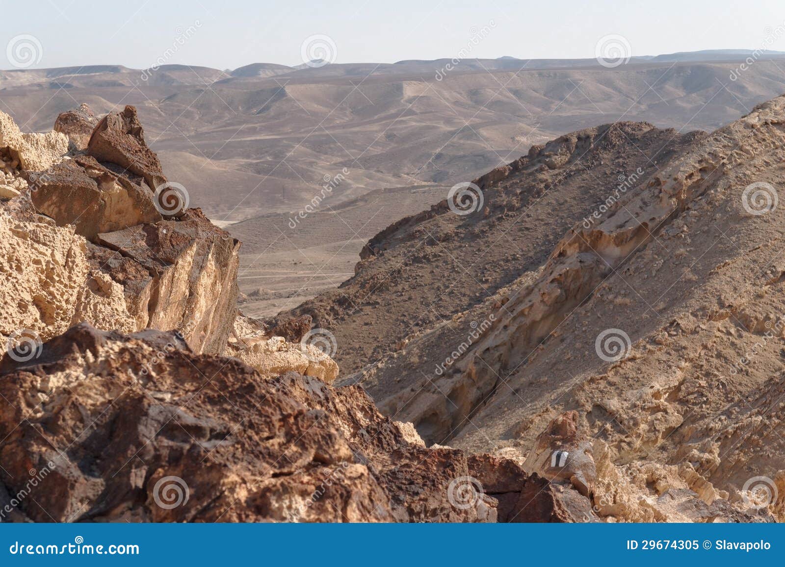 Jagged Rocks on the Edge of the Cliff in the Desert Stock Image - Image ...
