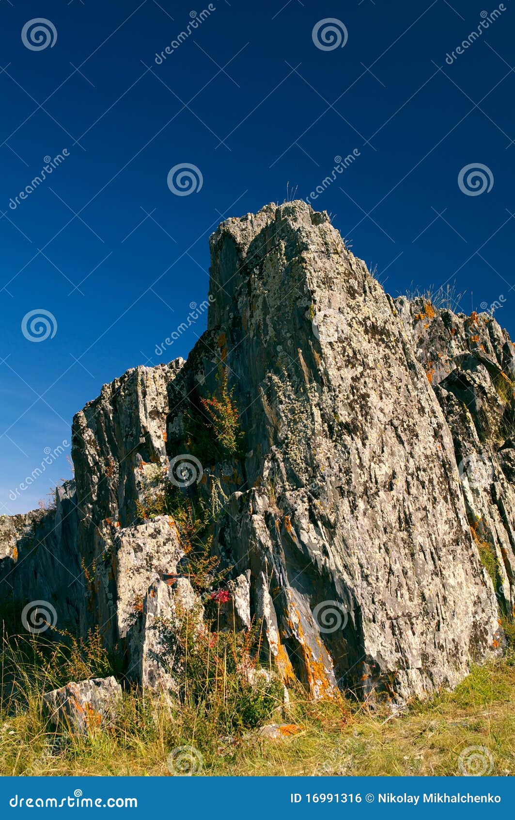 Jagged rocks and sky stock photo. Image of grass, outdoor - 16991316