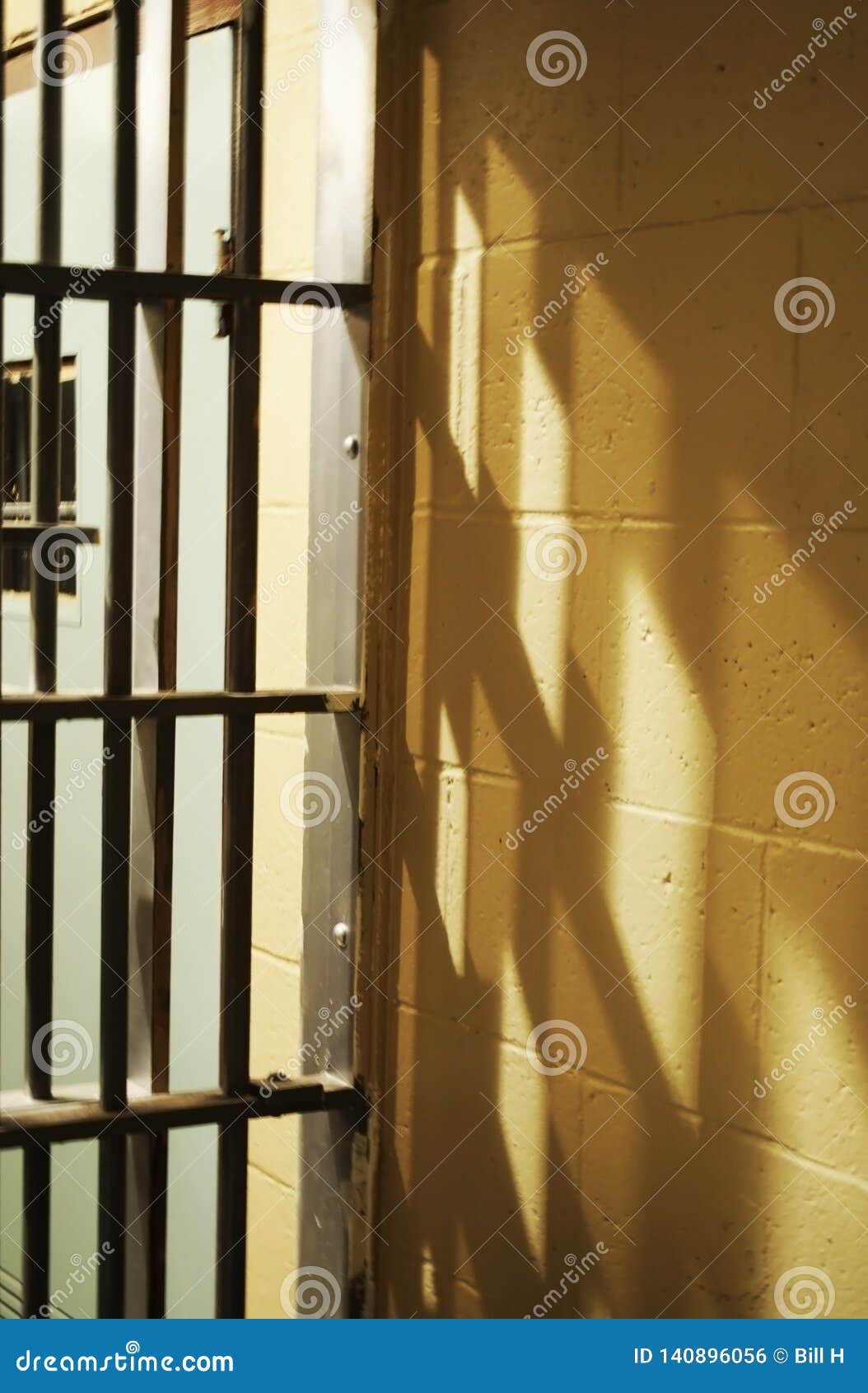 A Jail Cell Door with it`s Shadow Cast Stock Photo - Image of pattern ...