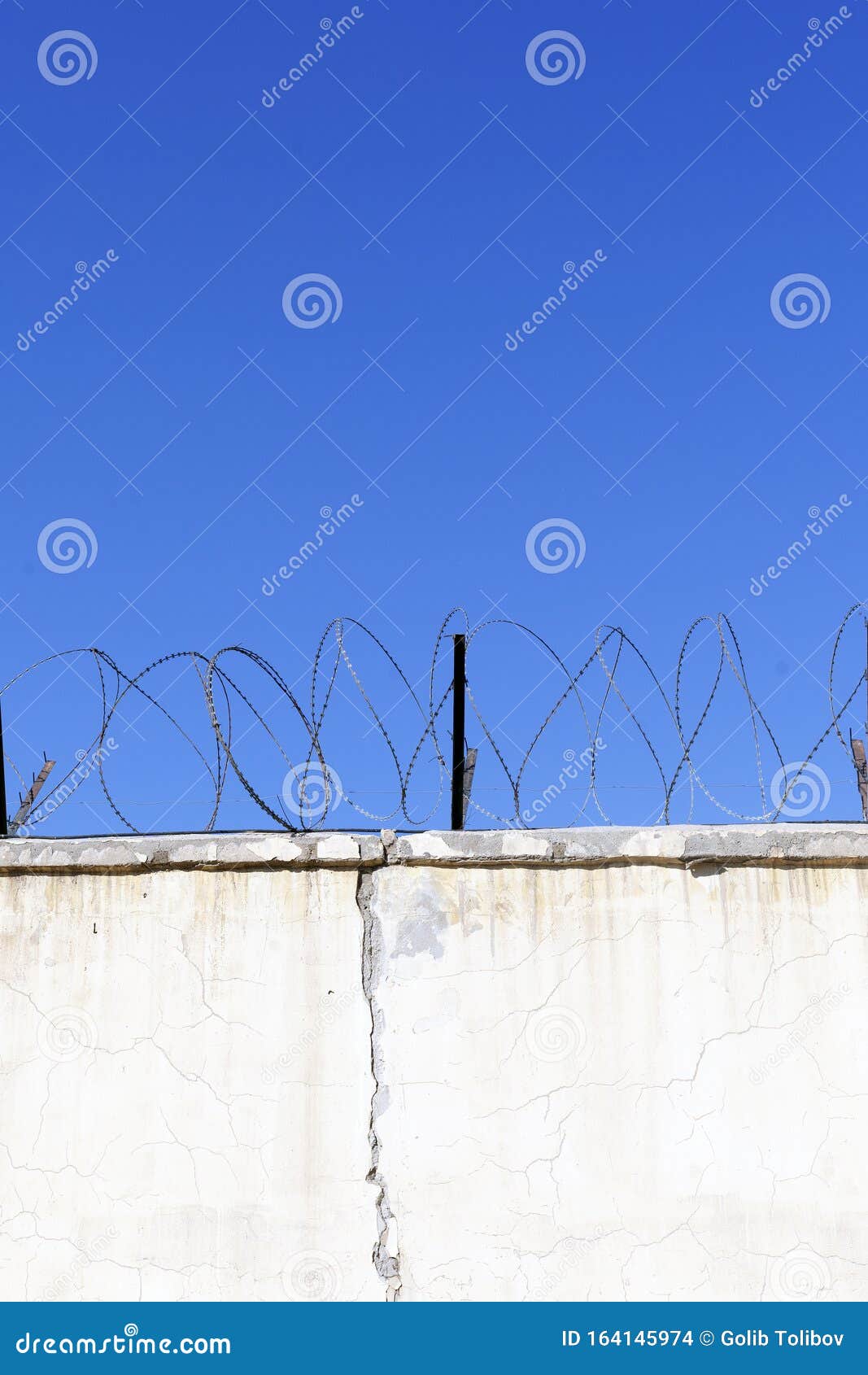 Jail Wall. Highly Protected Prison Wall with Barbed Wire Fence Stock ...
