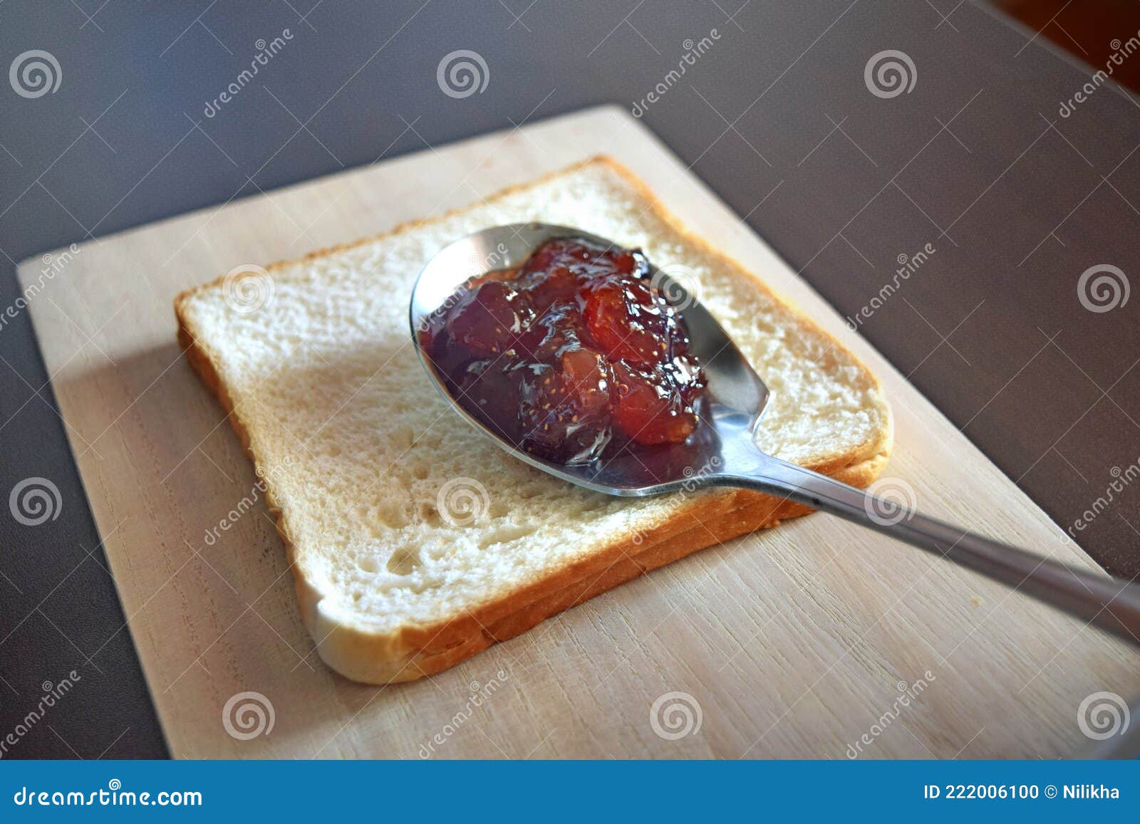 Jam on spoon stock photo. Image of delicious, photograph - 222006100