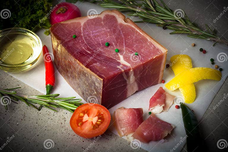 Jamon Piece Lying on the Table with Spices. Tinted Stock Photo - Image ...