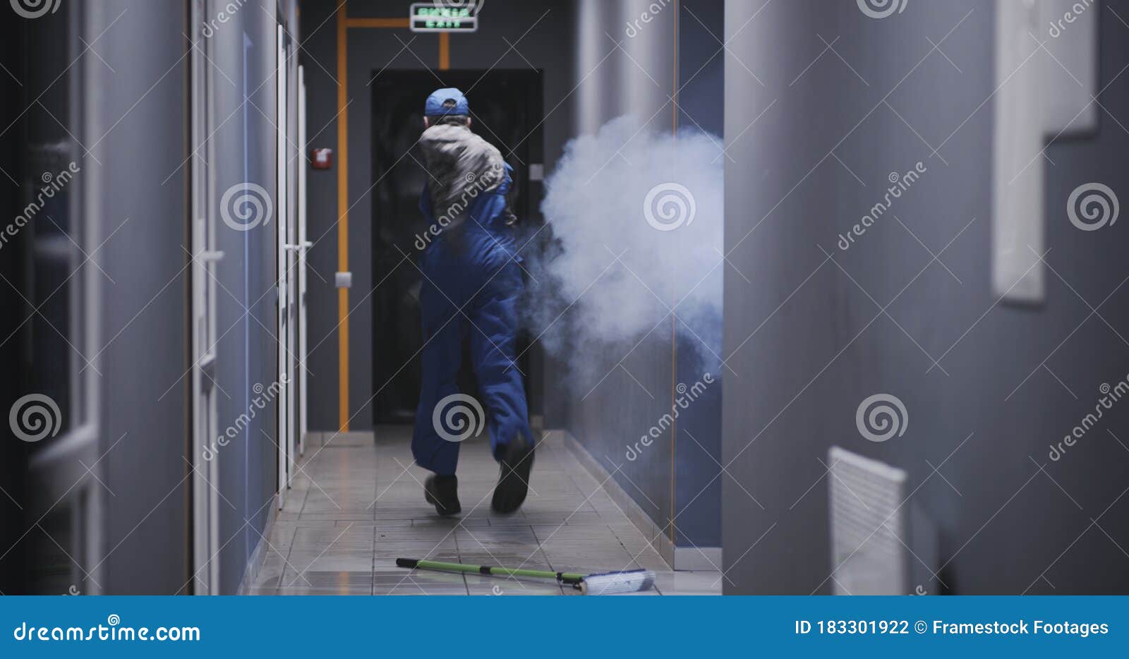 Janitor Cleaning a Corridor when Fire Breaks Out Stock Photo - Image of ...