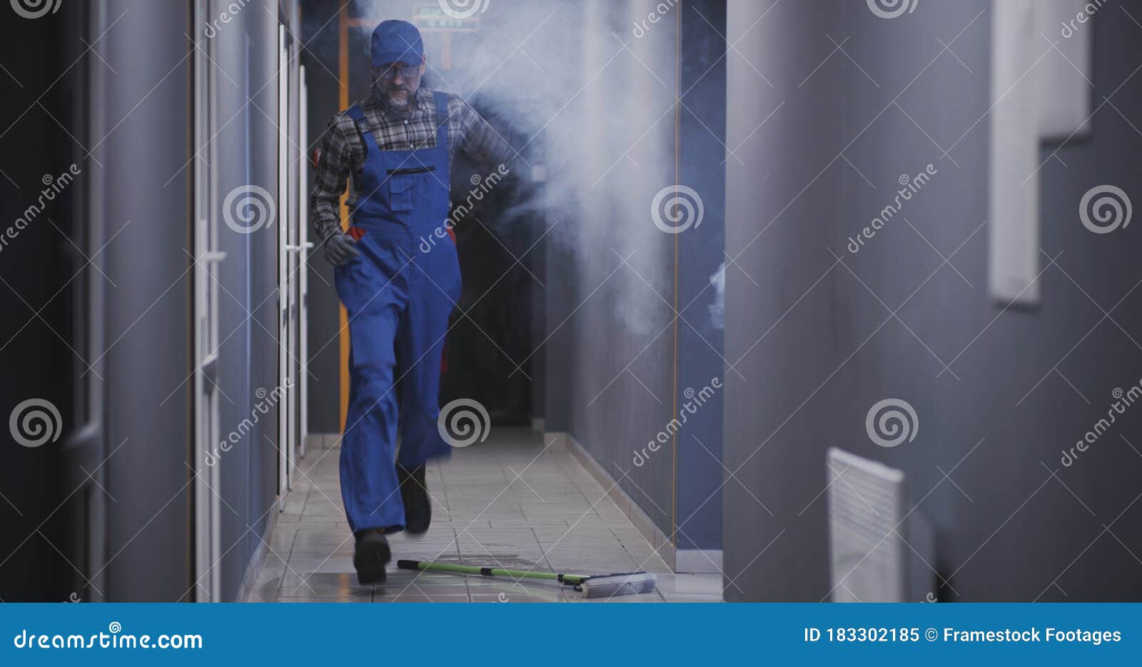 Janitor Cleaning a Corridor when Fire Breaks Out Stock Image - Image of ...