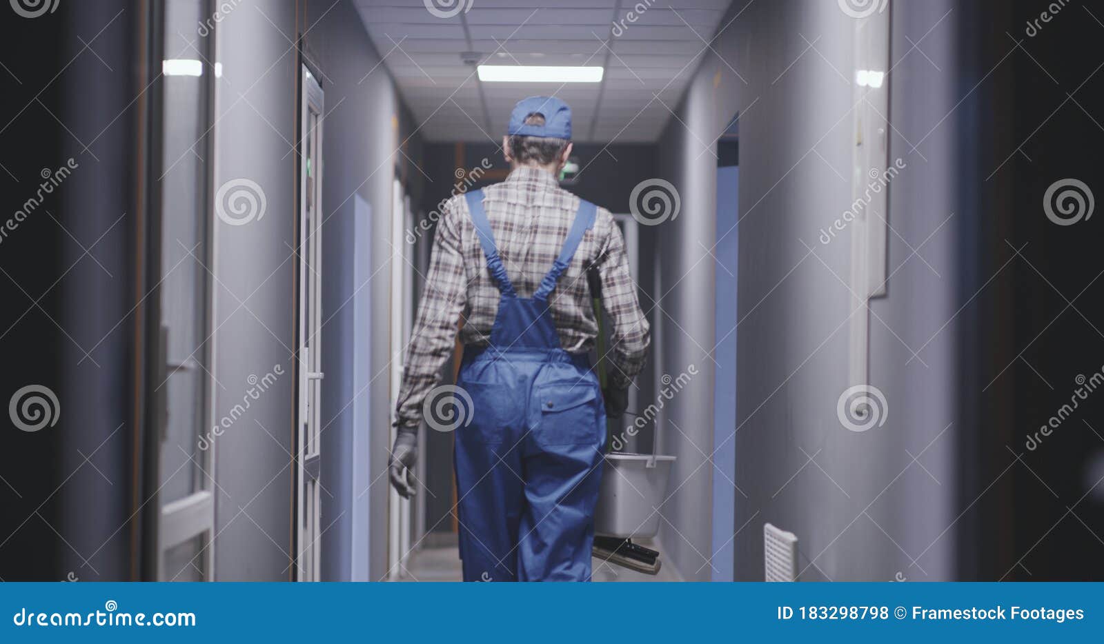 Janitor Cleaning a Corridor Stock Photo - Image of uniform, corridor ...