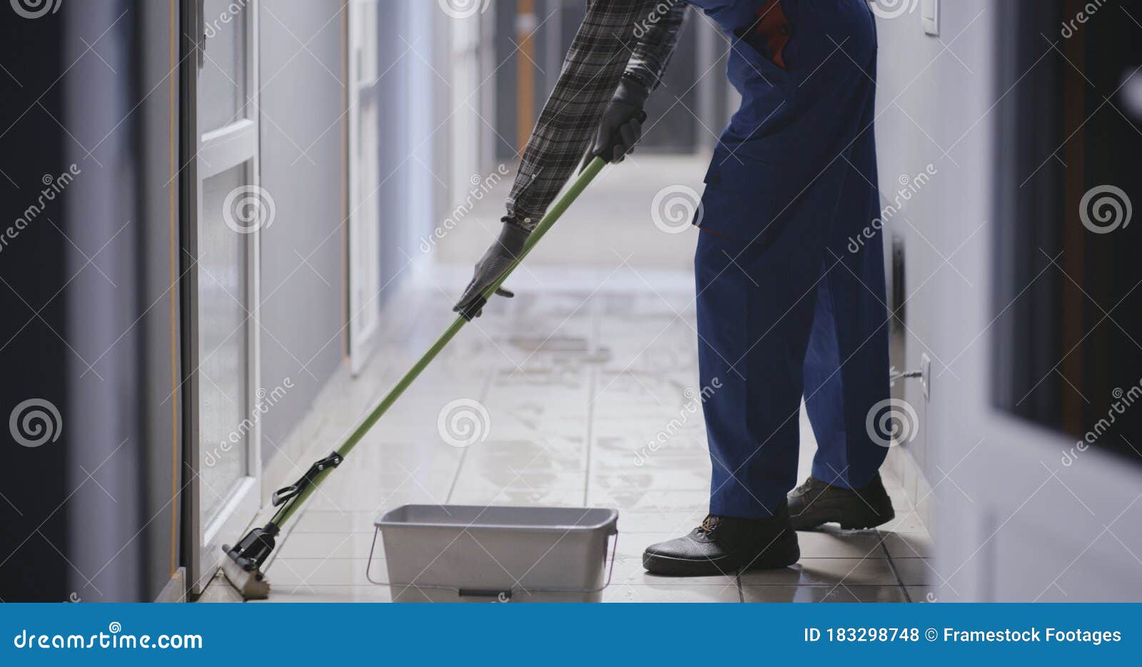 Janitor Cleaning a Corridor Stock Photo - Image of corridor, indoors ...