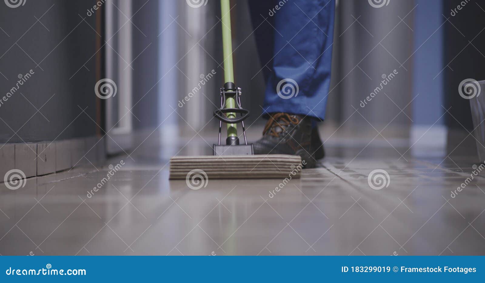 Janitor Cleaning a Corridor Stock Image - Image of indoors, building ...