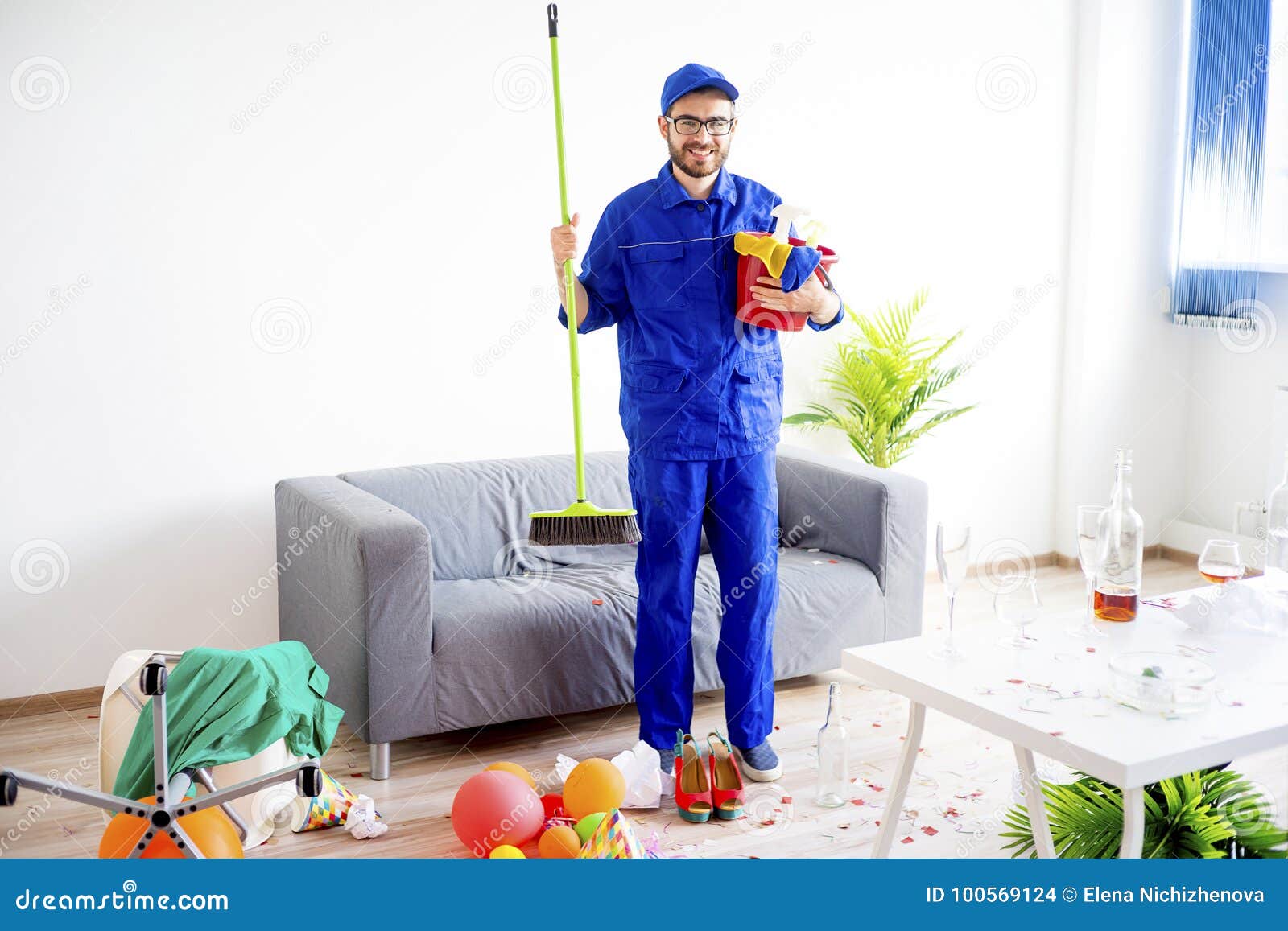 Janitor cleaning a mess stock photo. Image of person - 100569124