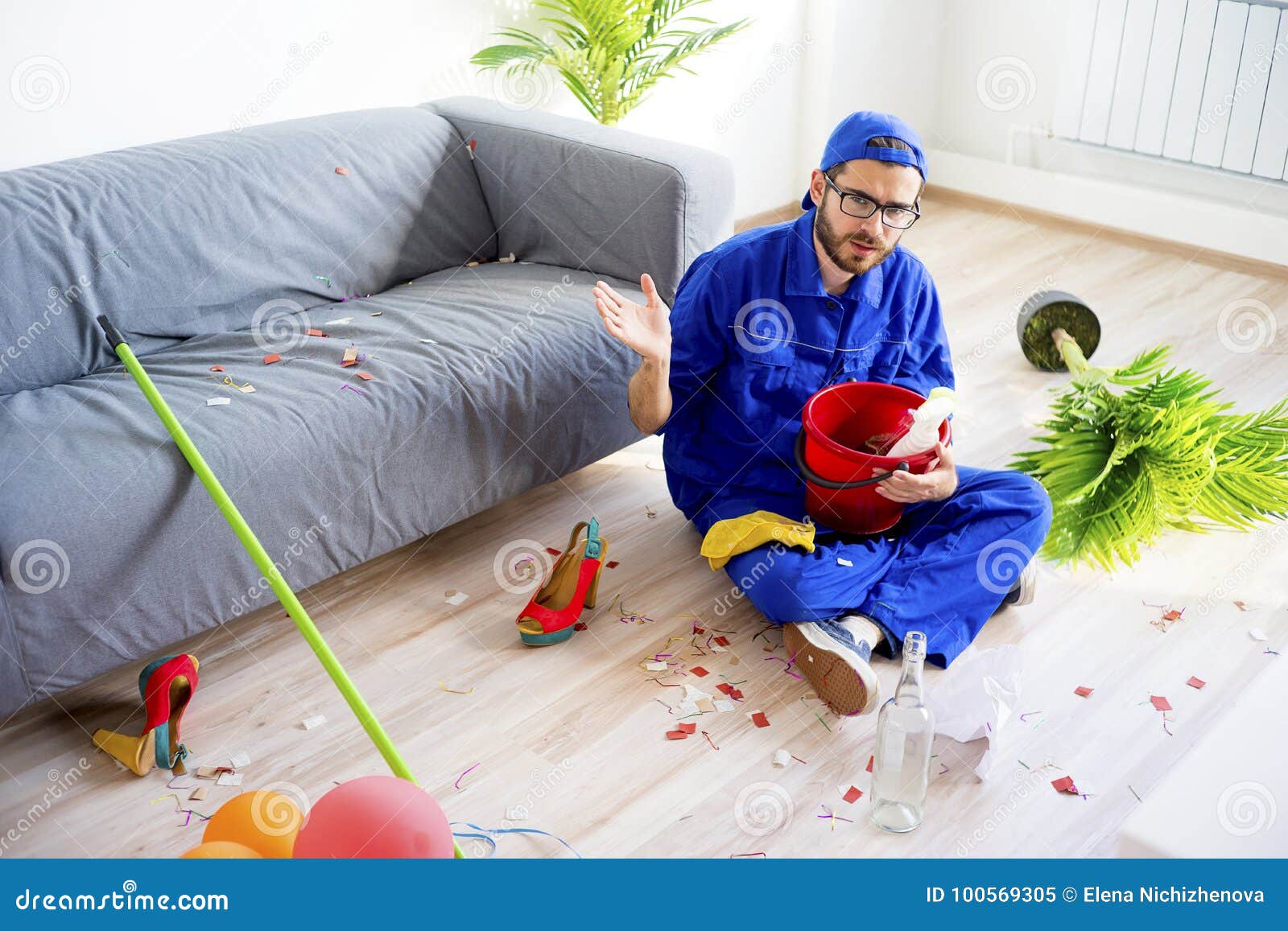 Janitor cleaning a mess stock image. Image of people - 100569305