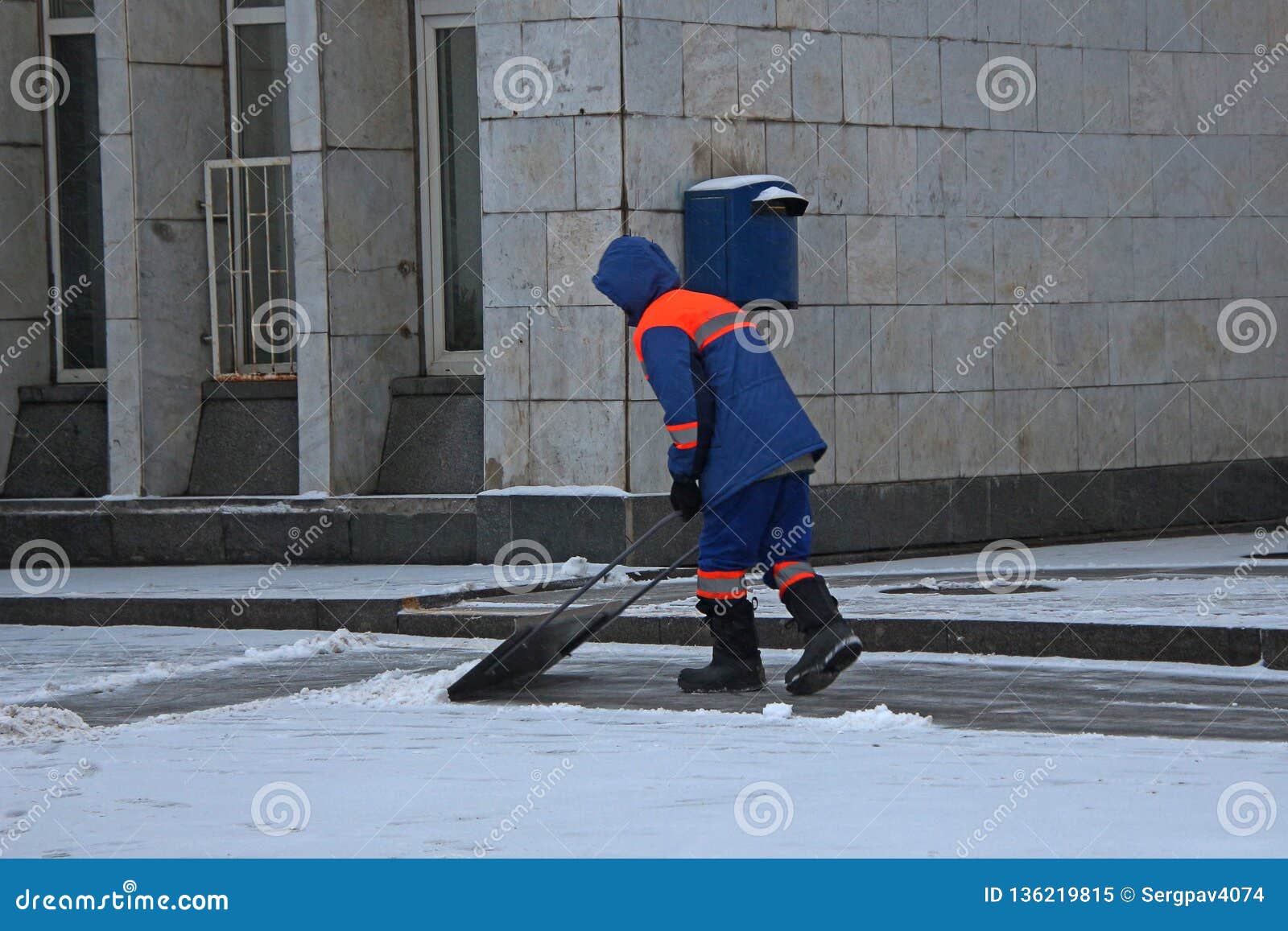 Janitor Cleaning Snow on the Sidewalk with a Shovel Editorial Image ... Janitor Cleaning Snow on the Sidewalk with a Shovel Editorial Image ...