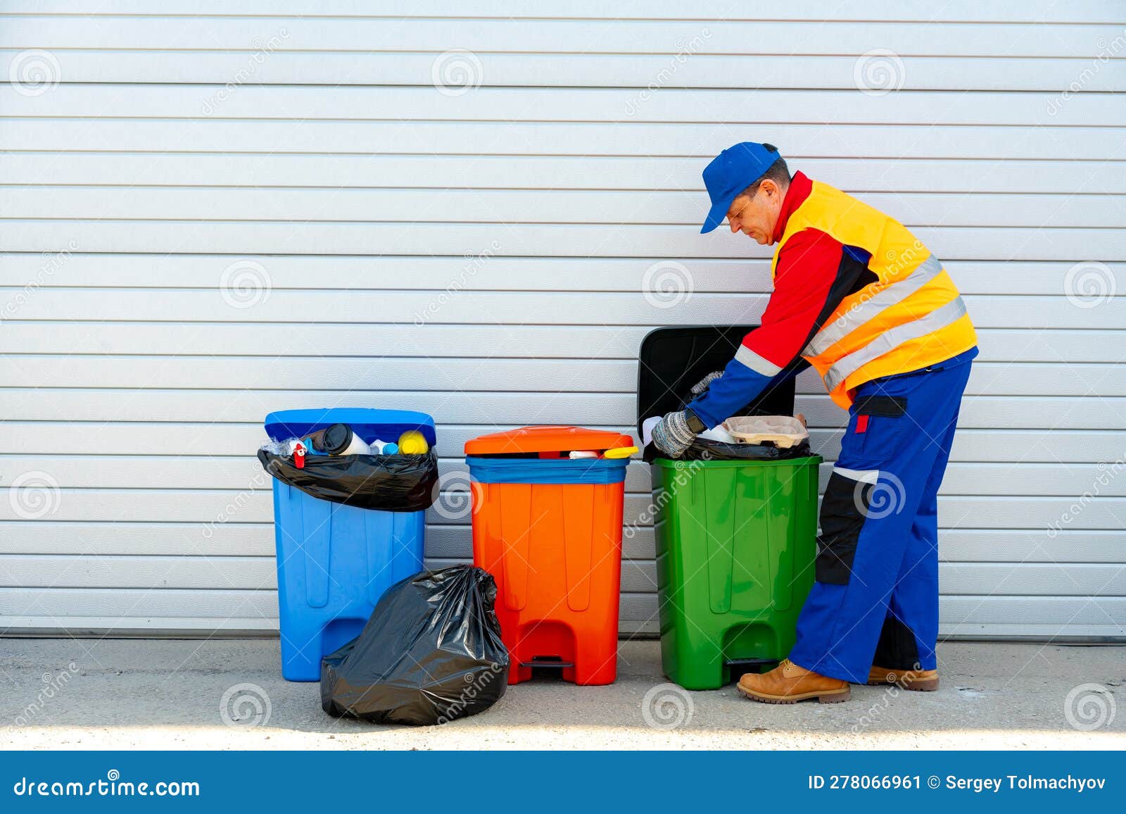 Janitor Takes Garbage Out of Trash Container Outdoors Stock Image ...