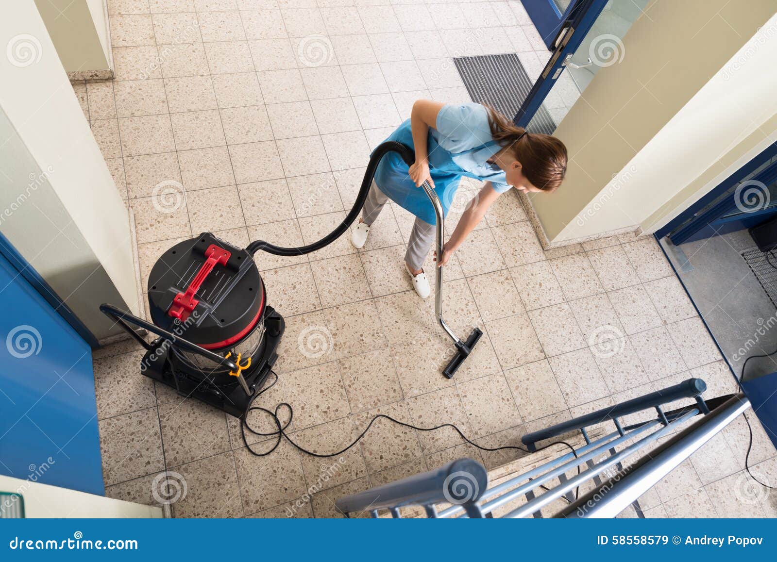 Janitor Vacuuming Floor stock image. Image of labor, floor - 58558579